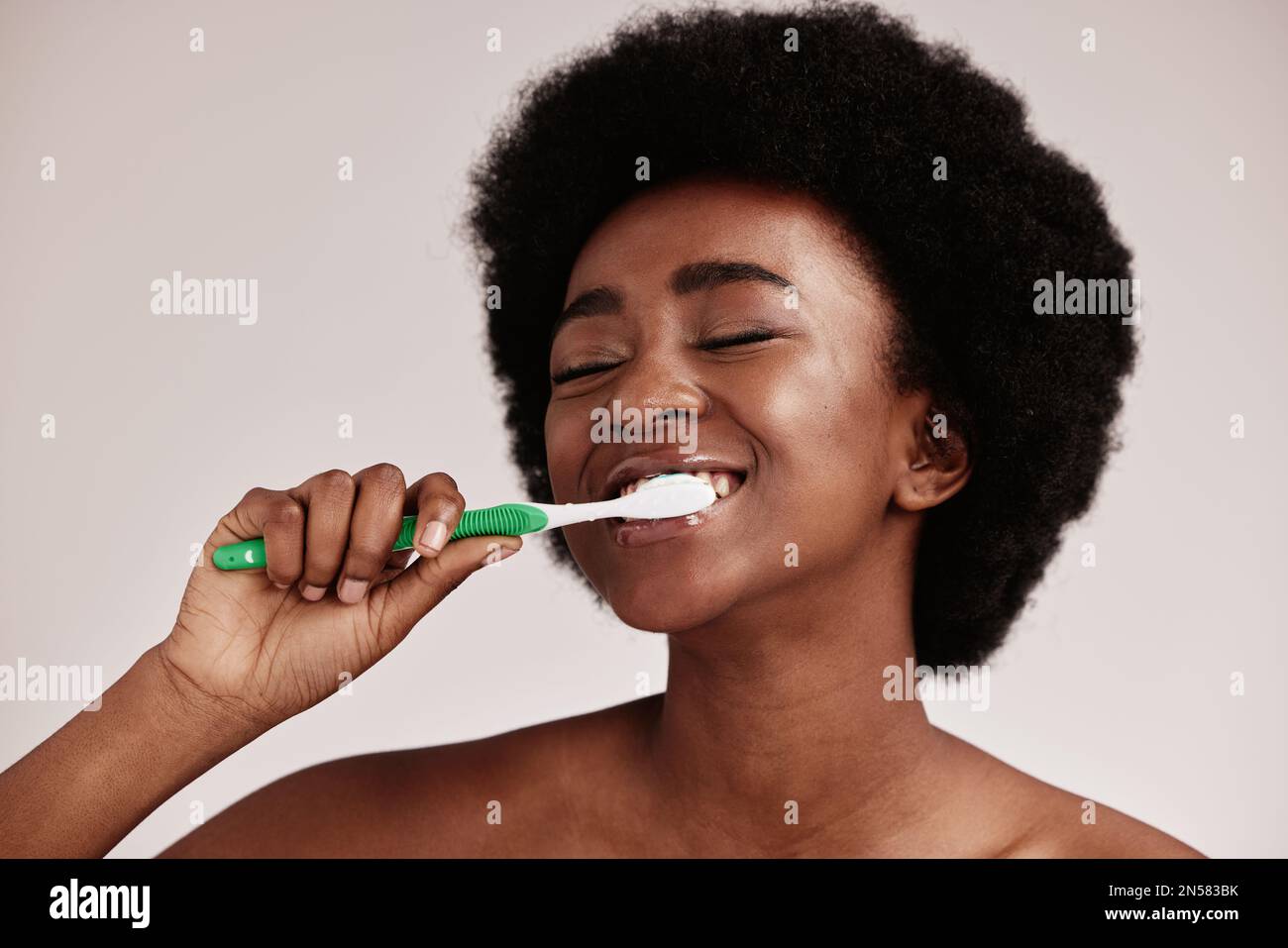 Toothbrush, brushing teeth and black woman for clean and healthy mouth ...