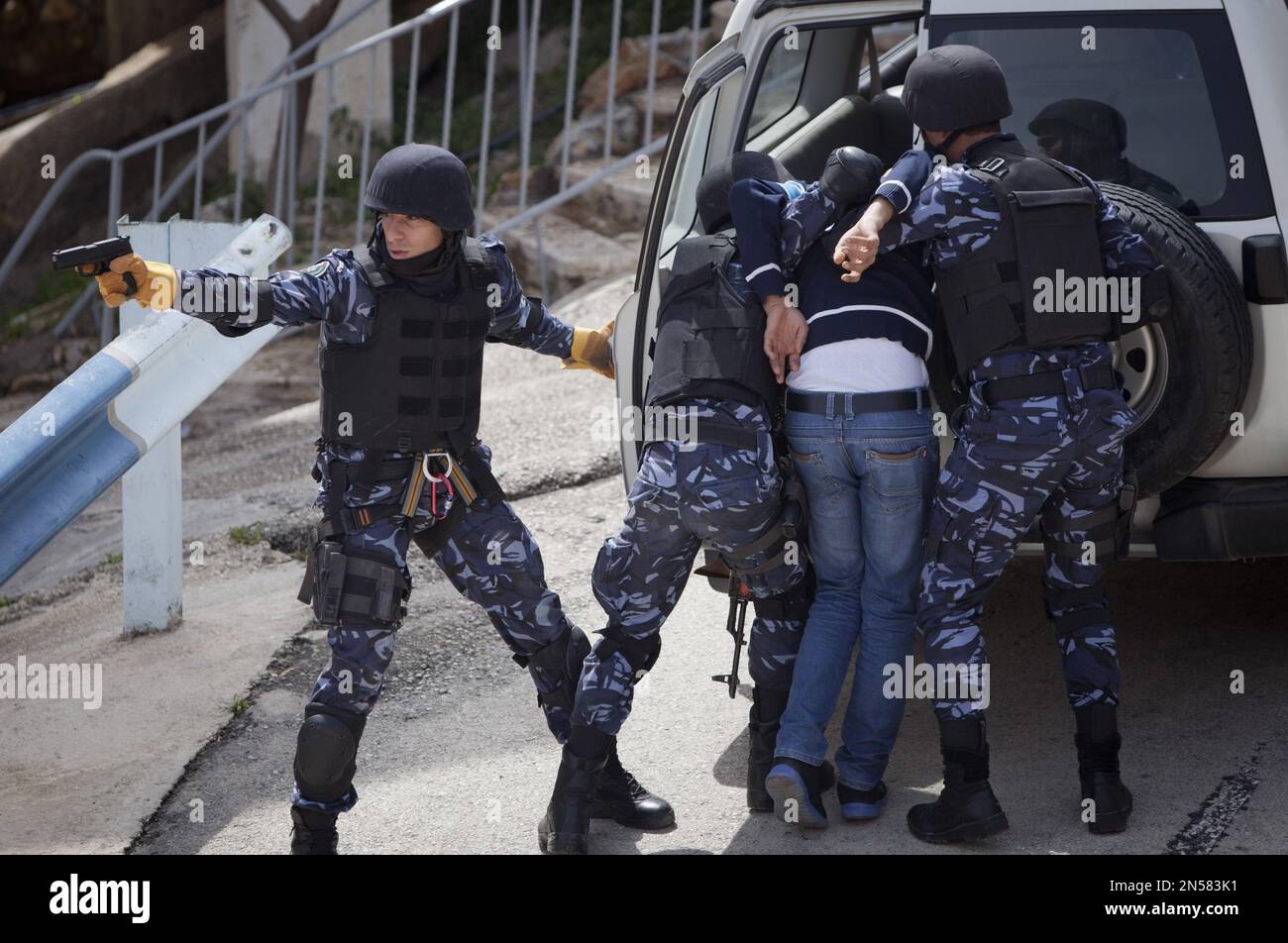Members of the Palestinian special police force show their skills ...