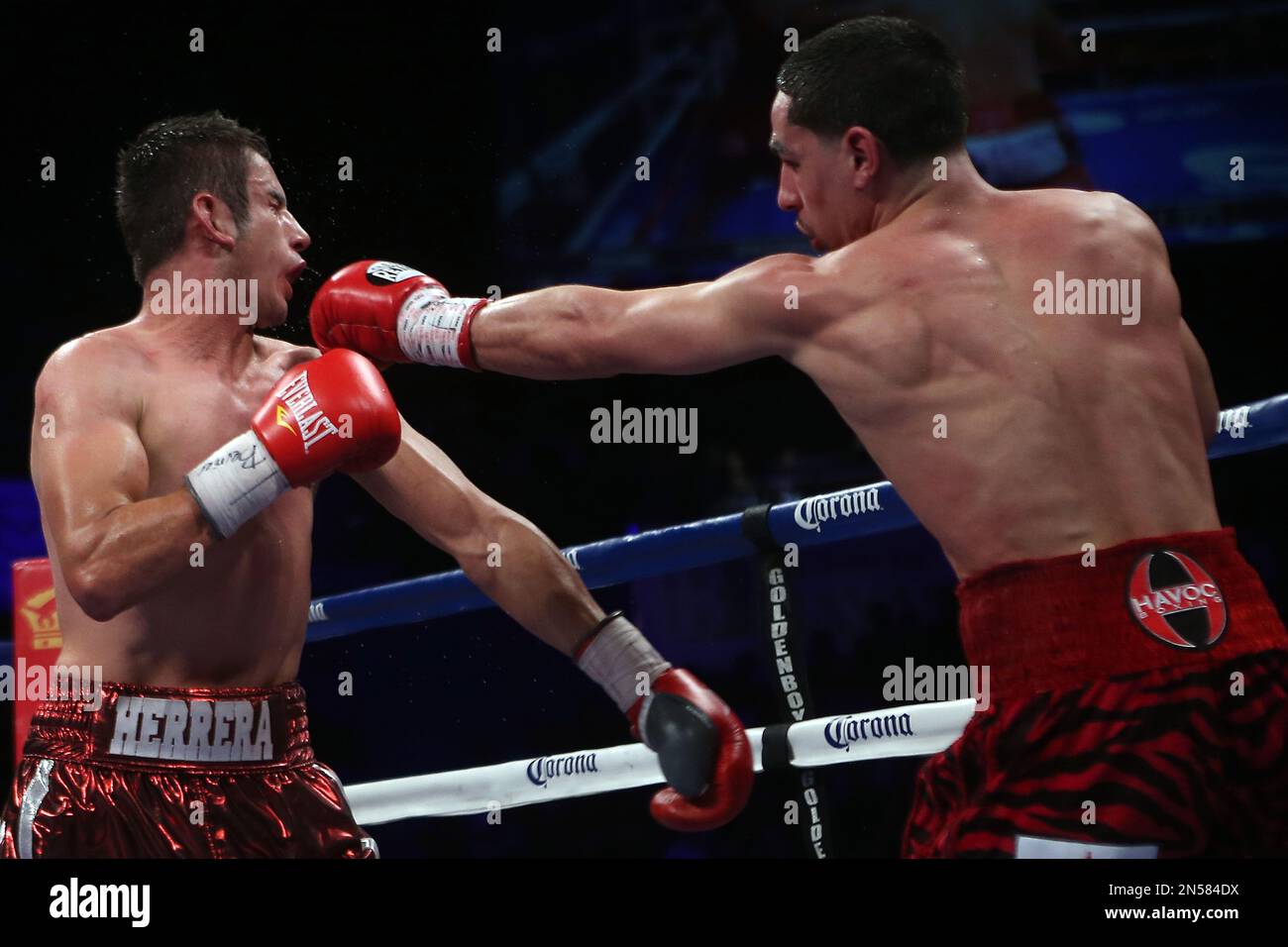 Unified Super Lightweight World Champion Danny "Swift" Garcia, right ...