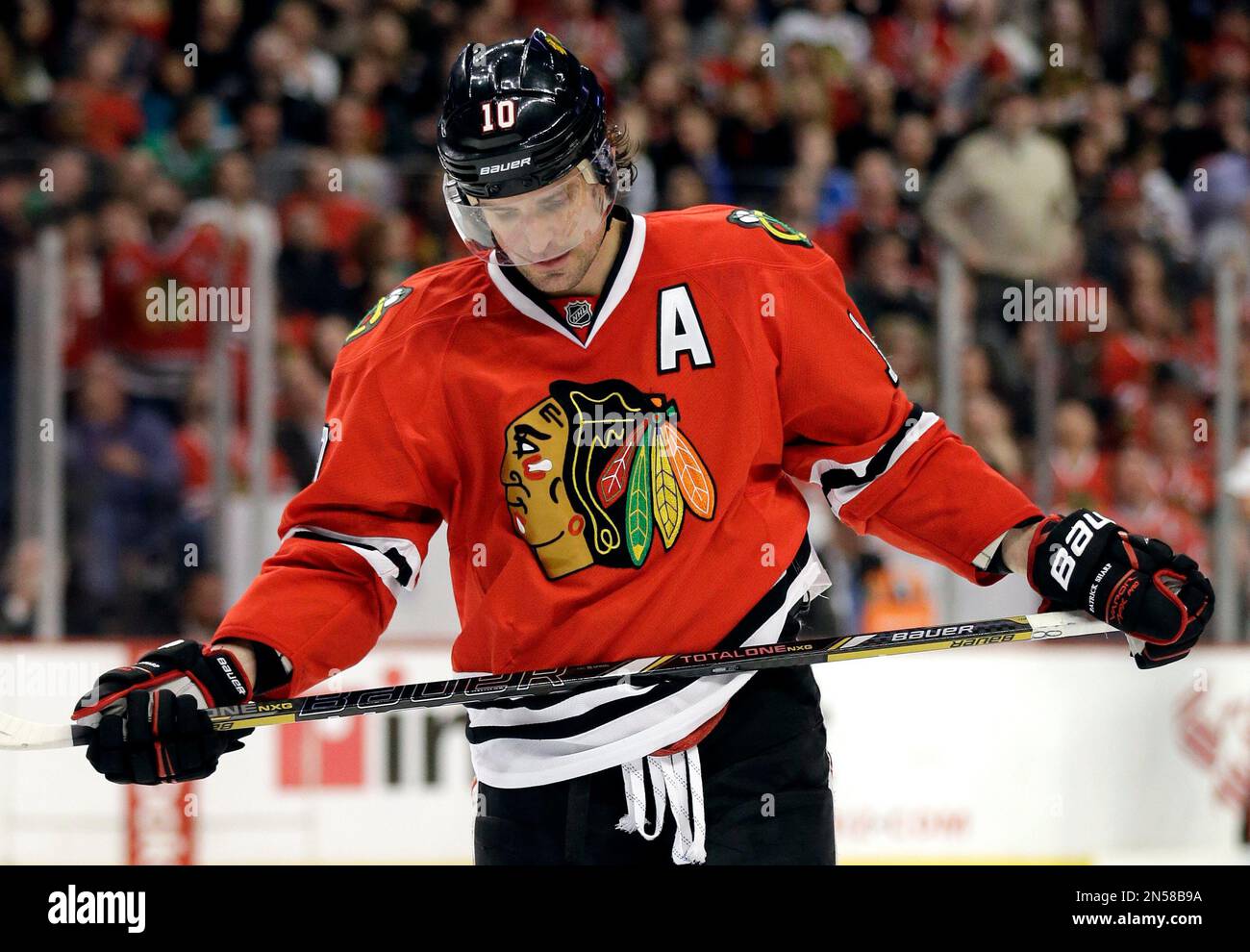 Chicago Blackhawks' Patrick Sharp looks down during the second period ...
