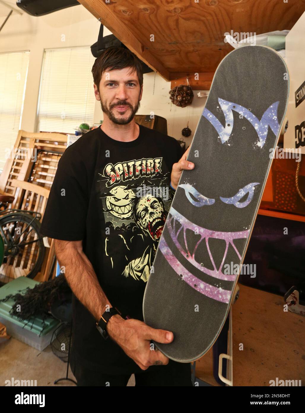 In this photo taken on Jan. 22, 2014, skateboarder Chris Cole shows off ...