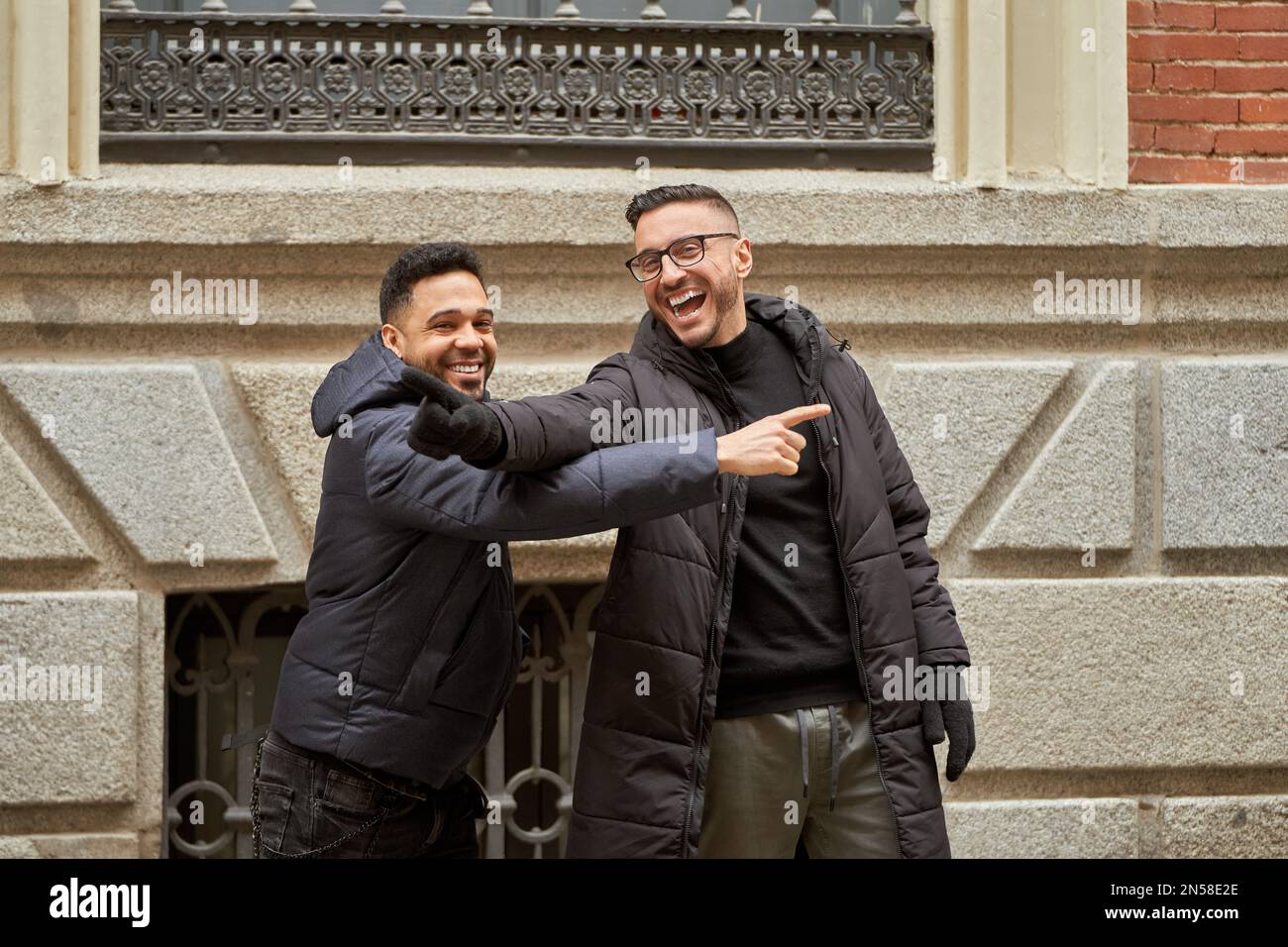 Pointing two ways hi-res stock photography and images - Alamy