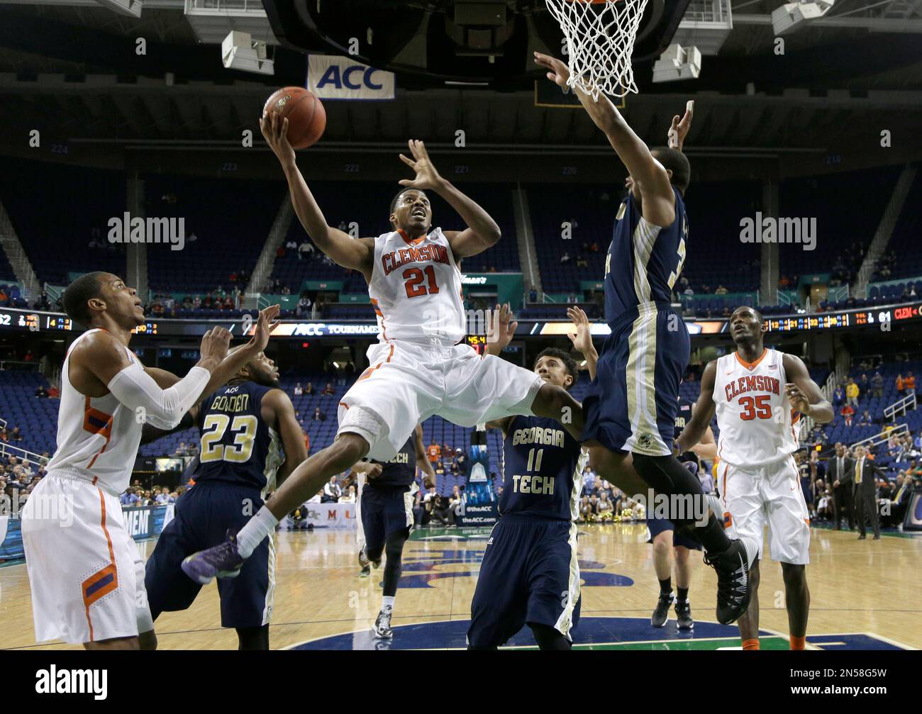 Clemson's Damarcus Harrison (21) shoots afteduring overtime of a second ...