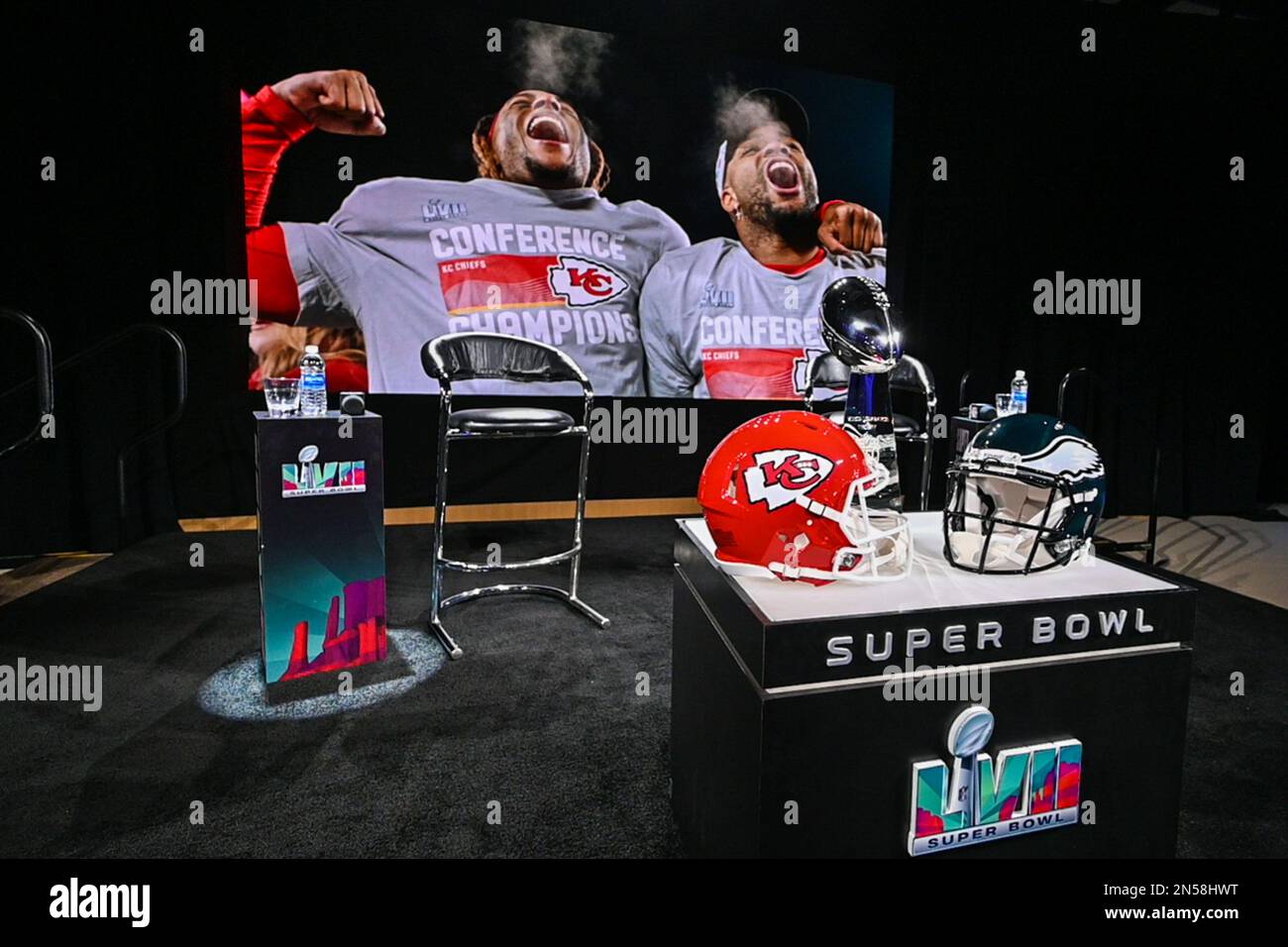 The Vince Lombardi trophy and helmets for the Chiefs and Eagles sit on ...