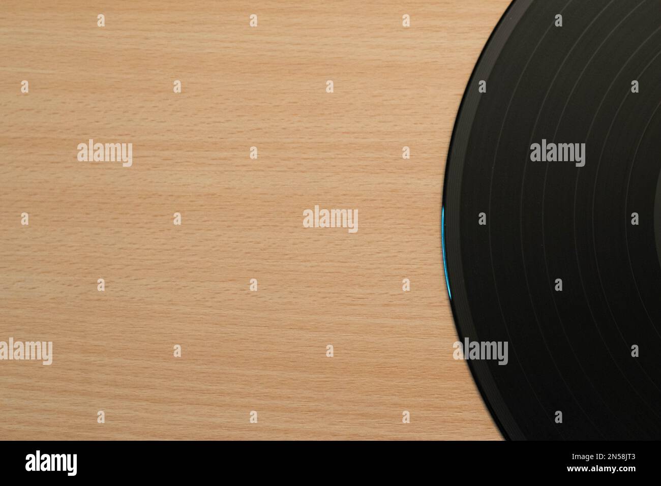 vinyl record on table for backgrounds Stock Photo - Alamy