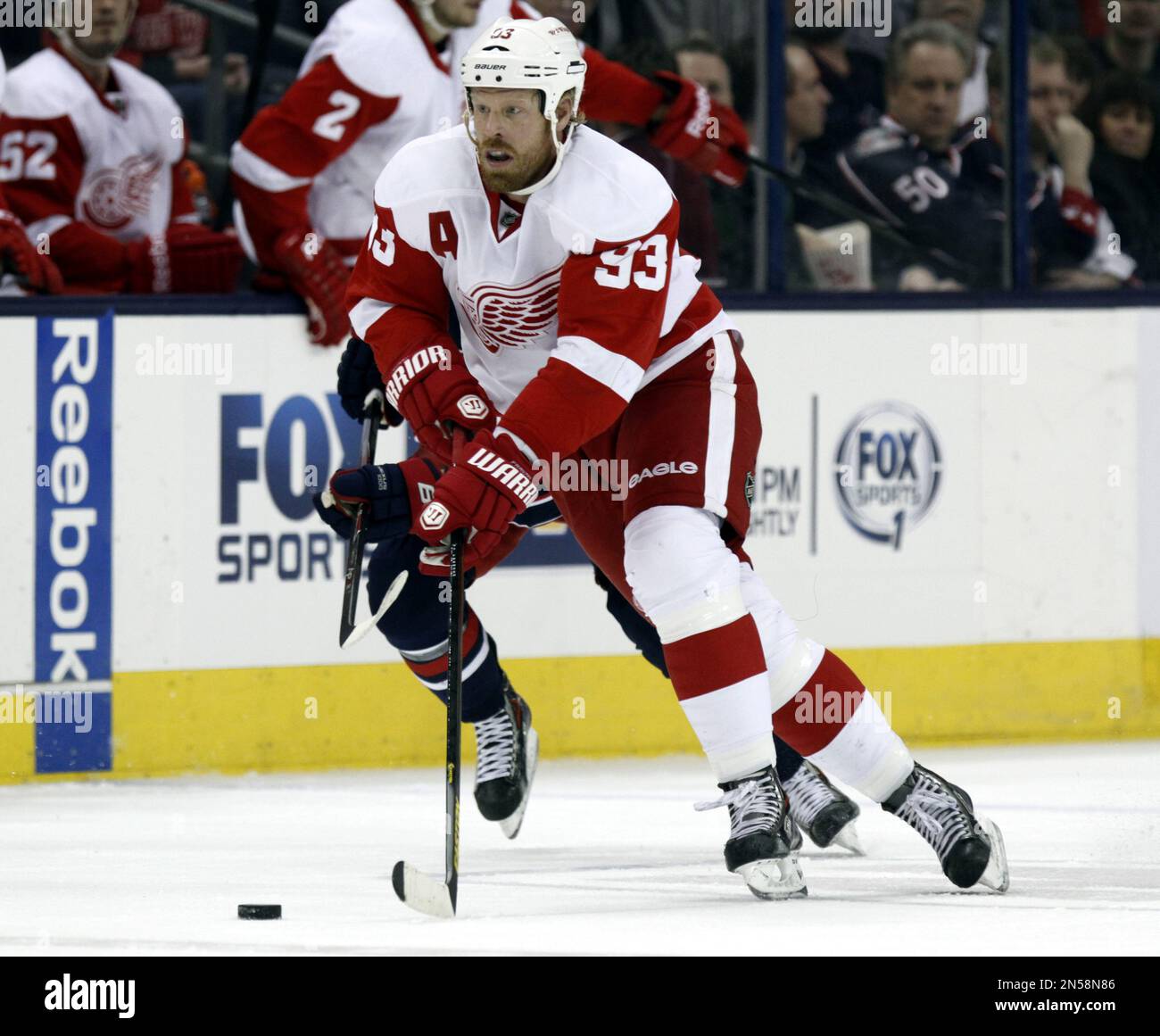 Detroit Red Wings' Johan Franzen, of Sweden, carries the puck against ...