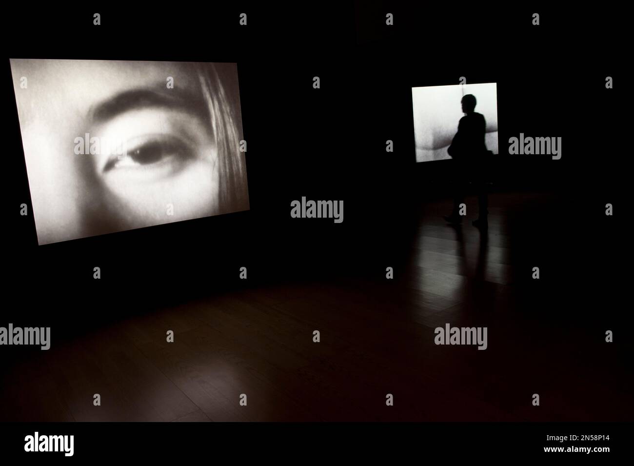A visitor walks past a work by Japanese artist, Yoko Ono, during the ...