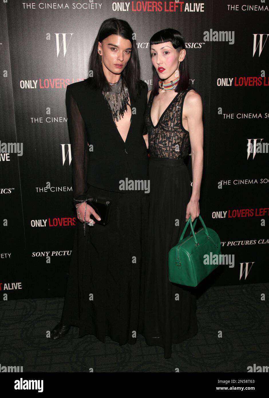 Fashion model Crystal Renn, left, and Michelle Harper, right, attend a ...