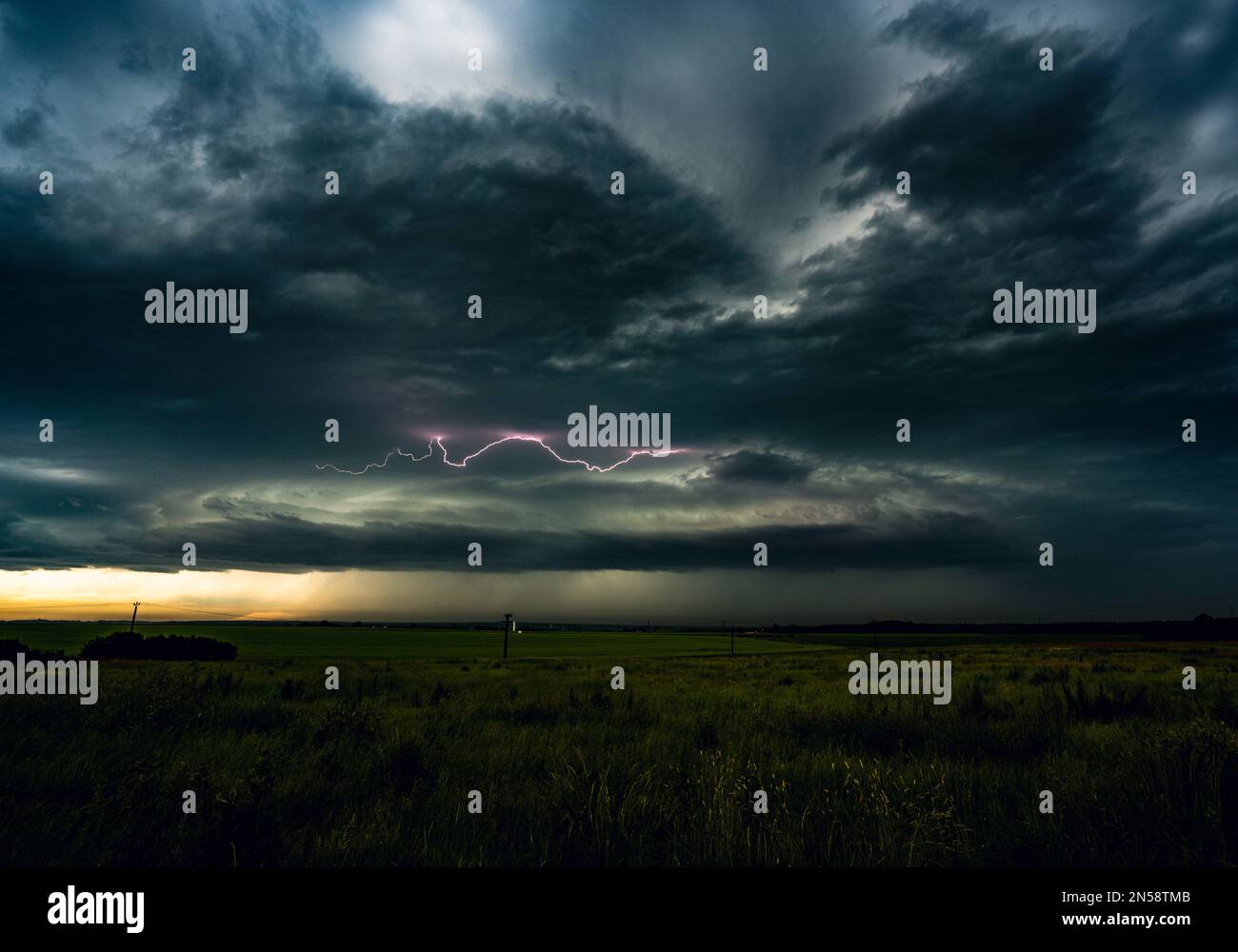An aerial view of greenery field during lightning Stock Photo - Alamy