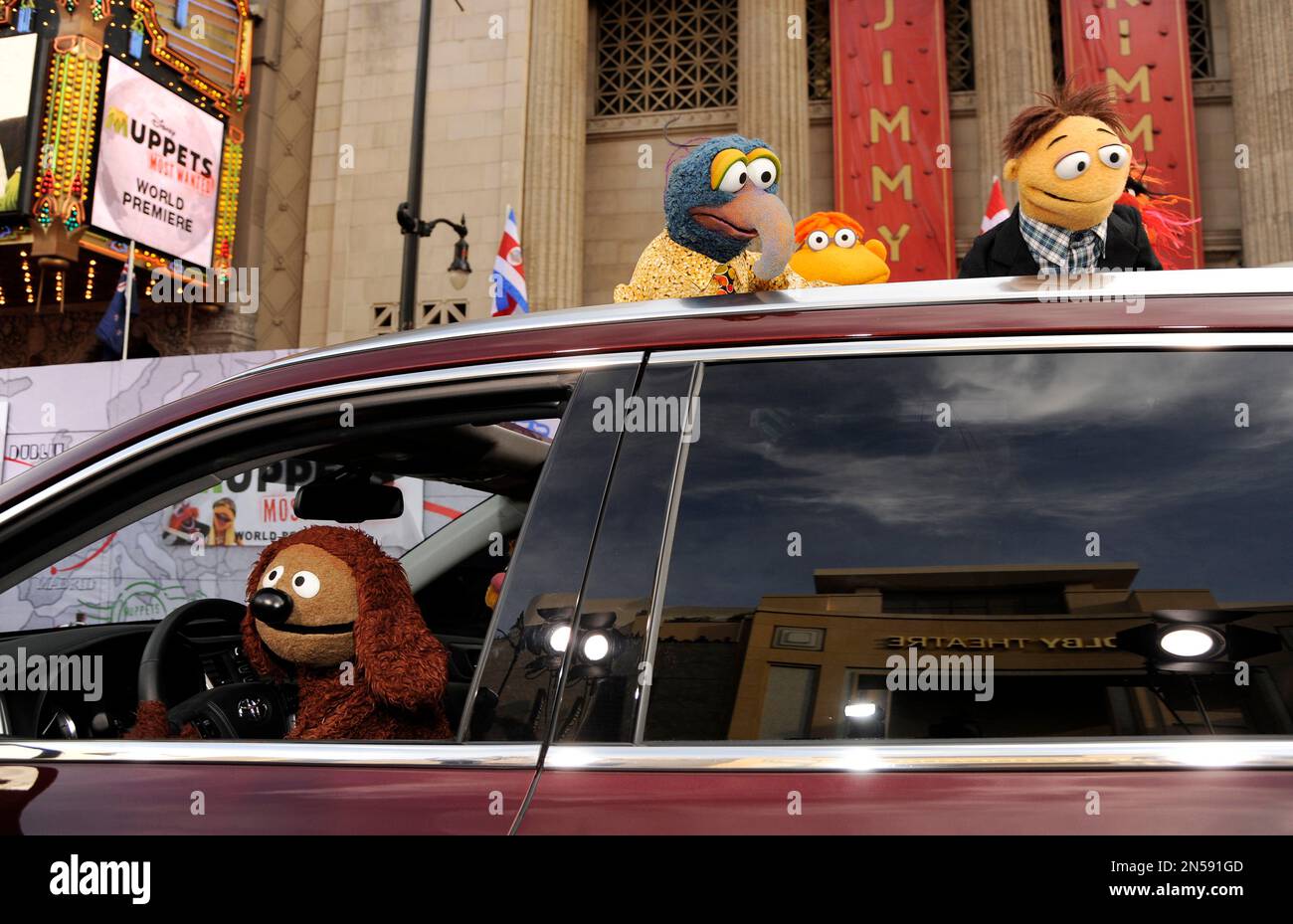 "Muppets Most Wanted" cast members arrive in cars at the premiere of ...