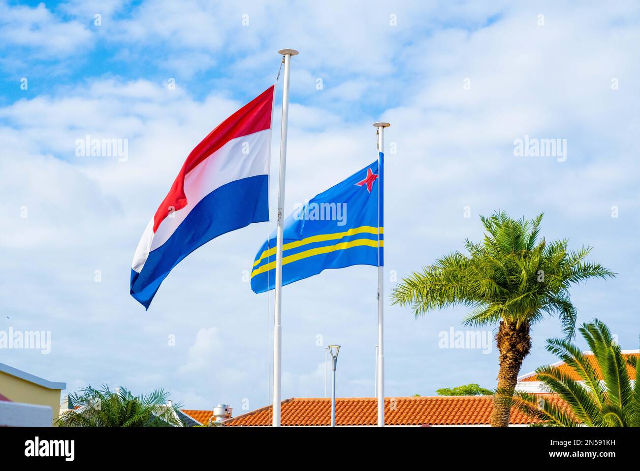 Dutch and Aruba flag, Dutch Caribbean island life in Oranjestad on ...