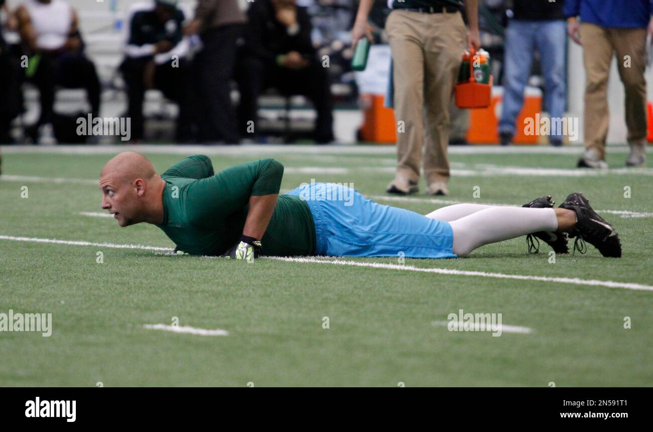 Former Michigan State linebacker Max Bullough runs a drill during pro ...