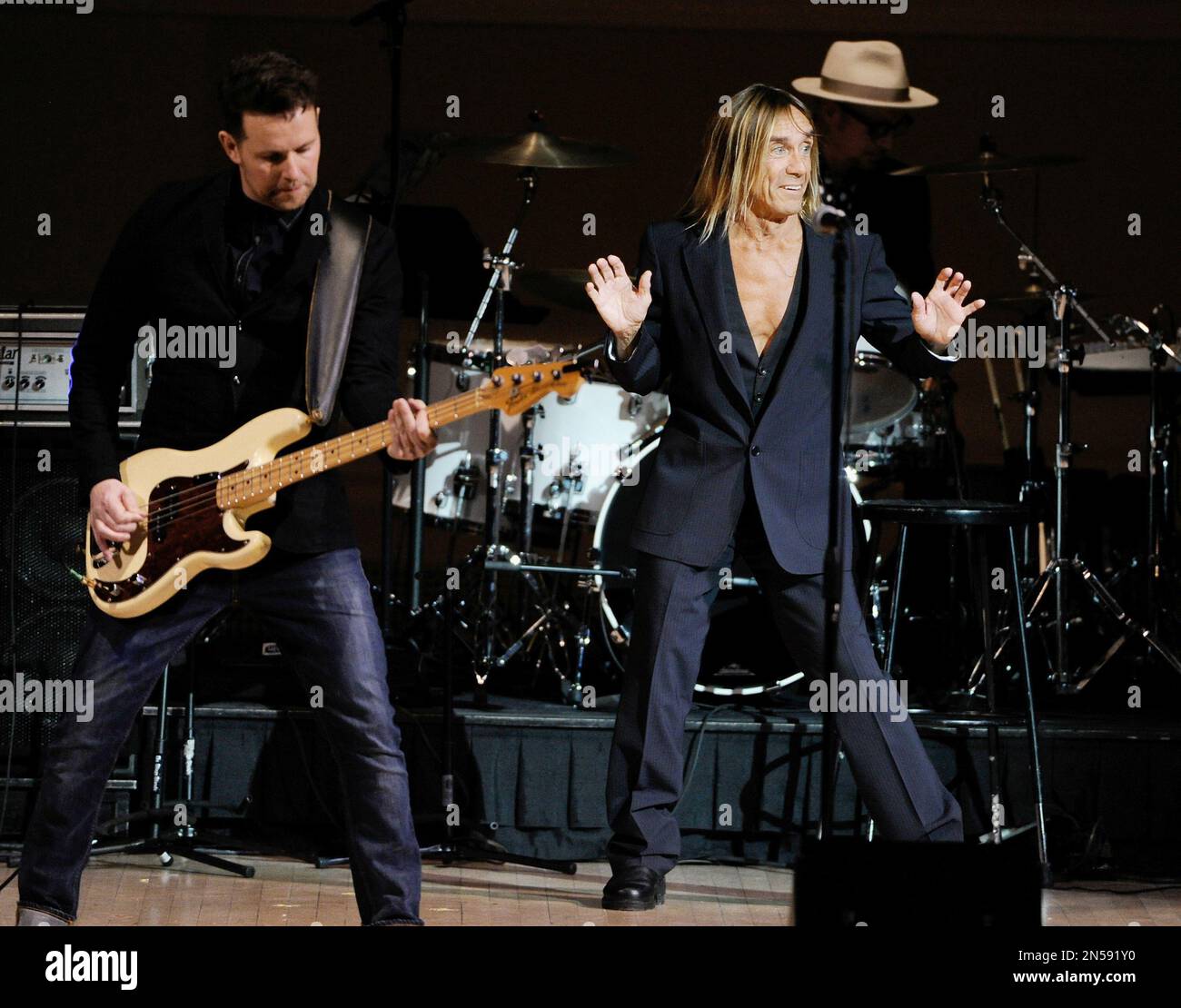 Singer Iggy Pop, right, performs with Tom Chapman from the band New ...