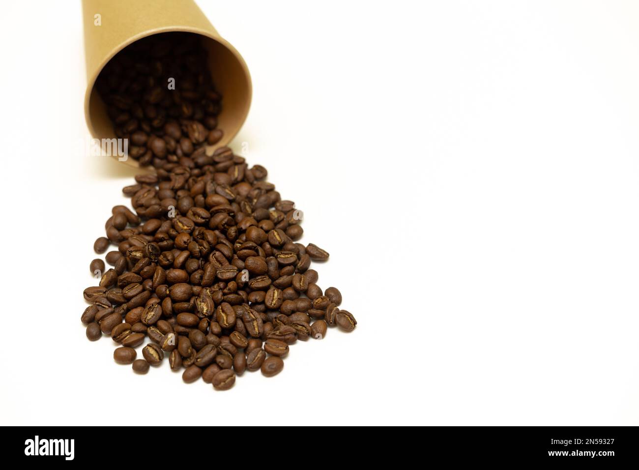 scattering of coffee beans shot on a white background. coffee on white ...