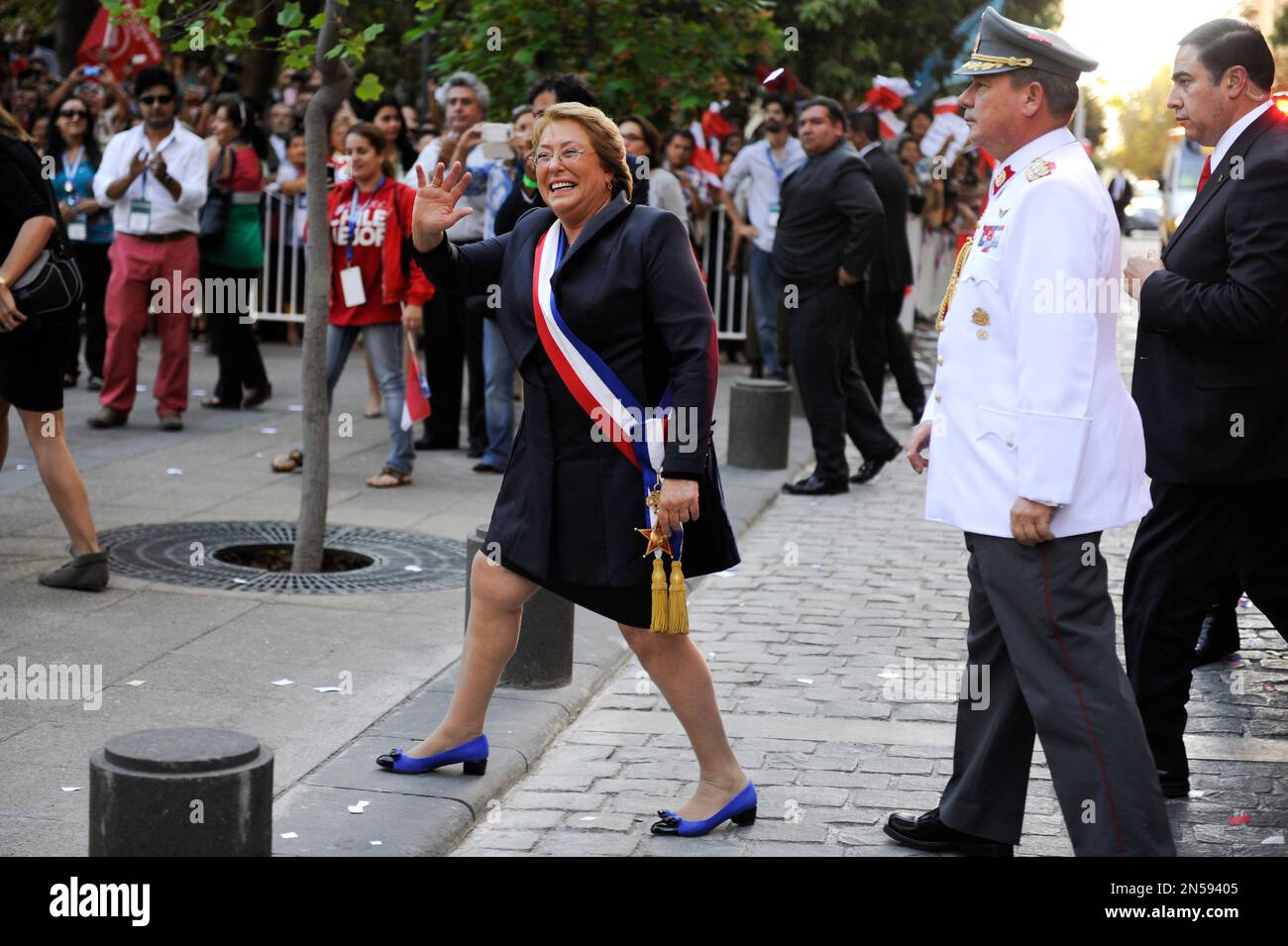 Chile's new President Michelle Bachelet waves as she arrives to La ...