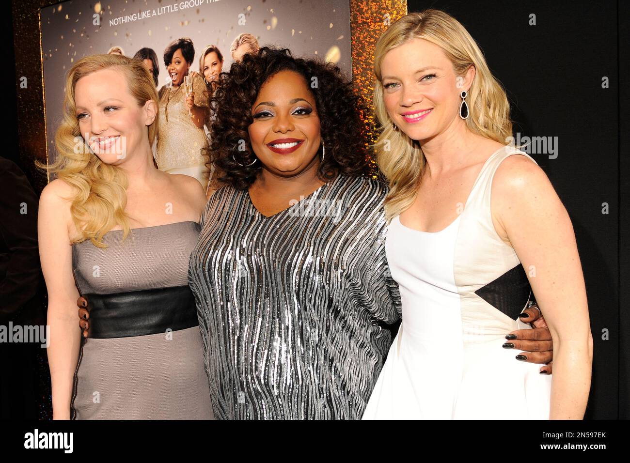 From left, Wendi McLendon-Covey, Cocoa Brown and Amy Smart arrive at ...