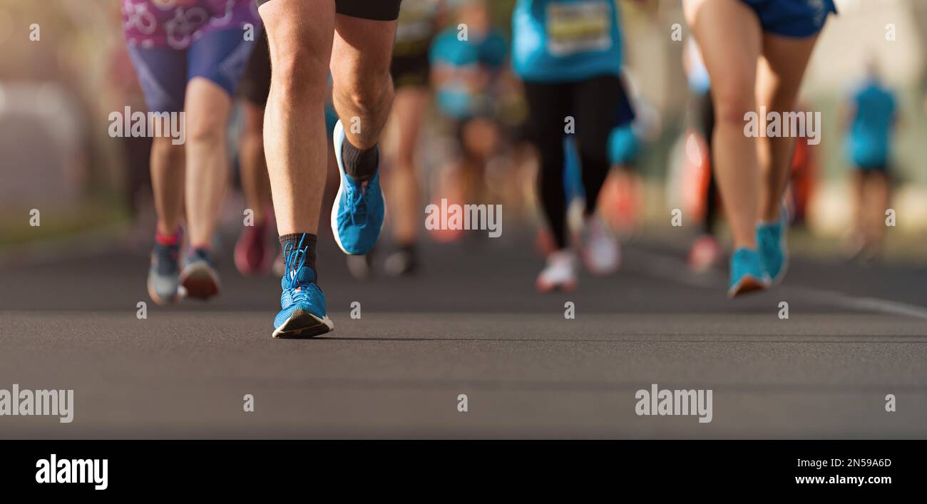 Marathon running race, people running on city road Stock Photo - Alamy