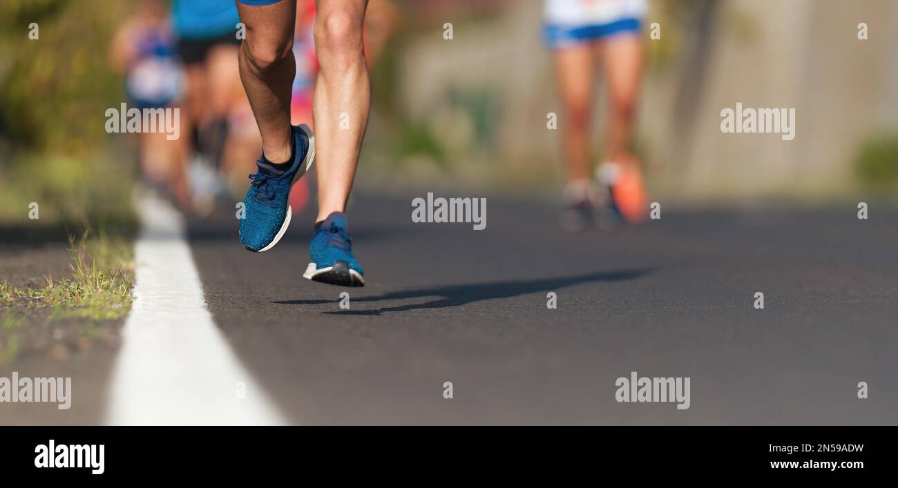 Marathon running race, people running on city road Stock Photo - Alamy