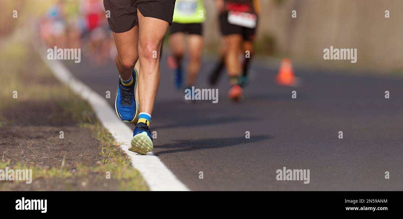 Marathon running race, people running on city road Stock Photo - Alamy