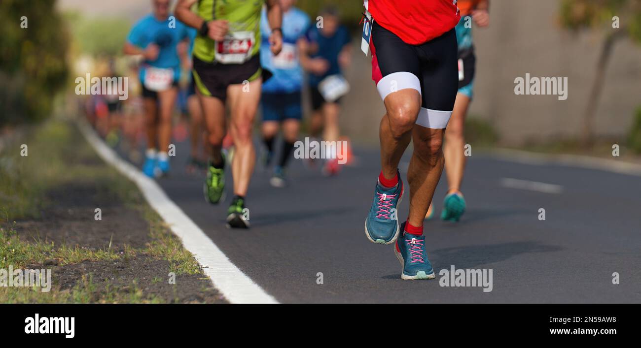 Marathon running race, people running on city road Stock Photo - Alamy