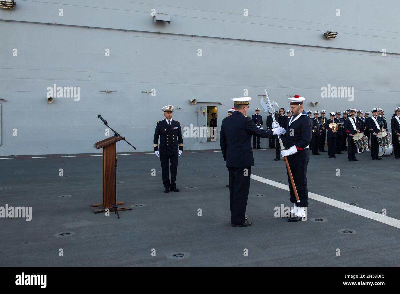 The halberd ceremony takes place on the amphibious helicopter carrier ...