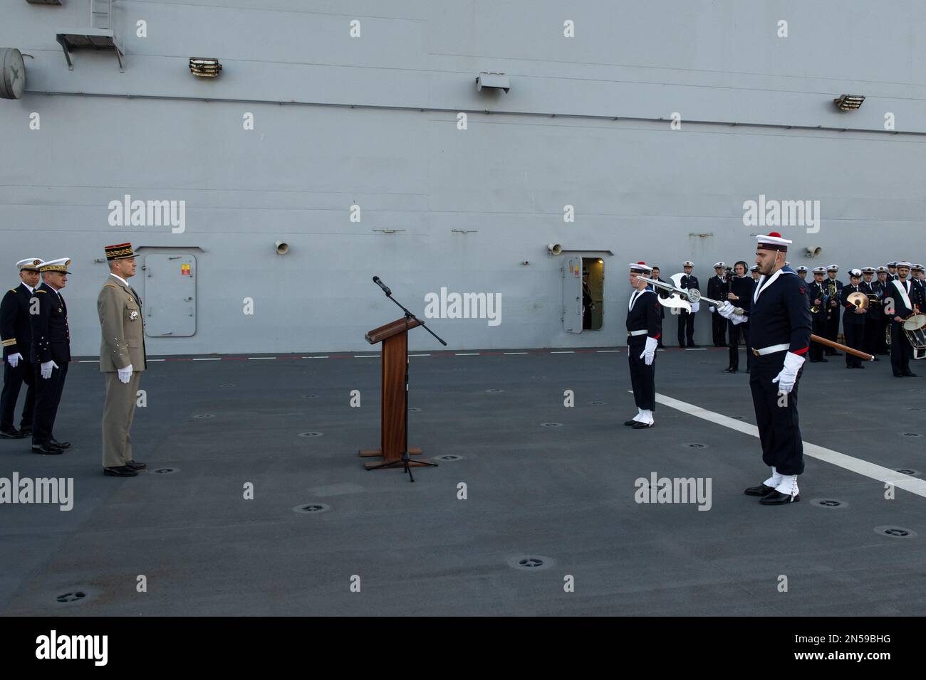 The halberd ceremony takes place on the amphibious helicopter carrier ...