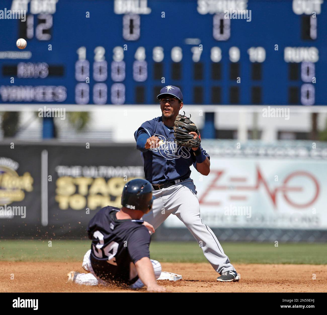 Tampa Bay Rays second baseman Cole Figueroa, top, puts out New York Yankees' Brian McCann (34 ...