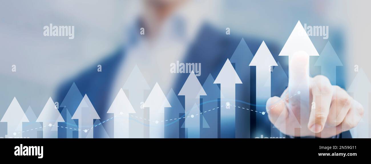 Business growth with businessman touching chart with arrows pointing up ...