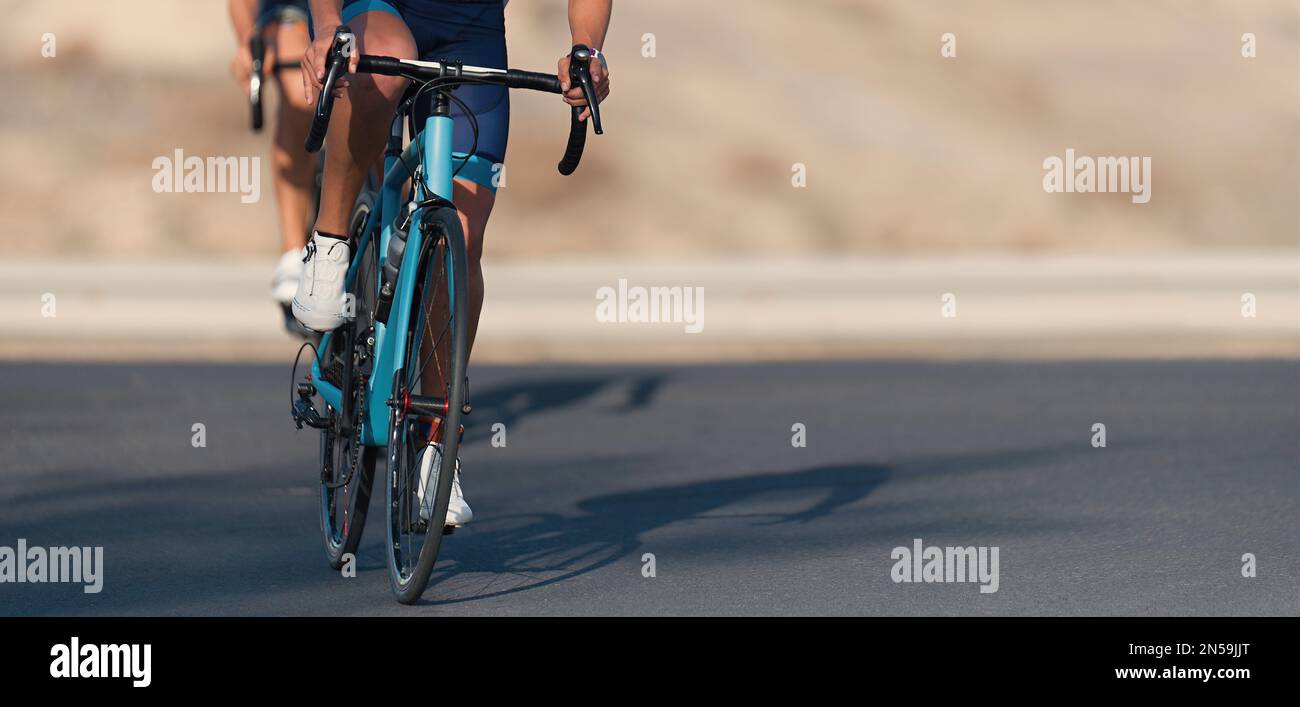 Cycling competition, cyclist athletes riding a race at high speed ...