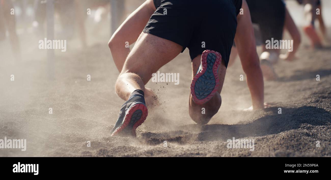 Crawling, passing under a wire obstacles during extreme obstacle race ...