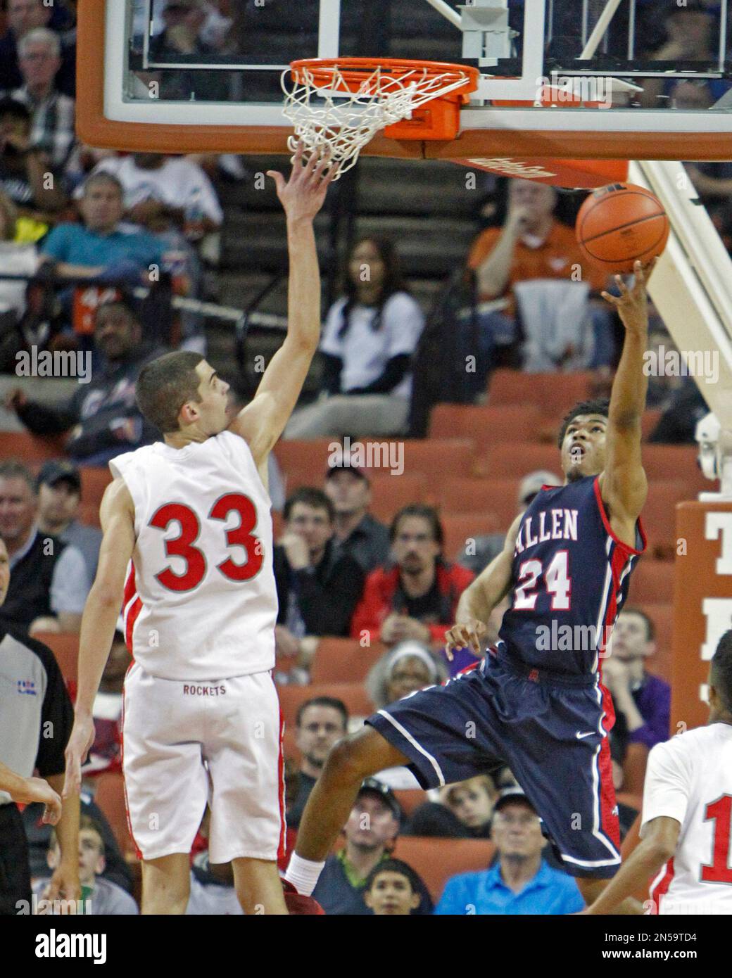 Allen guard Nick Rutherford (24) completes a reverse layup against ...
