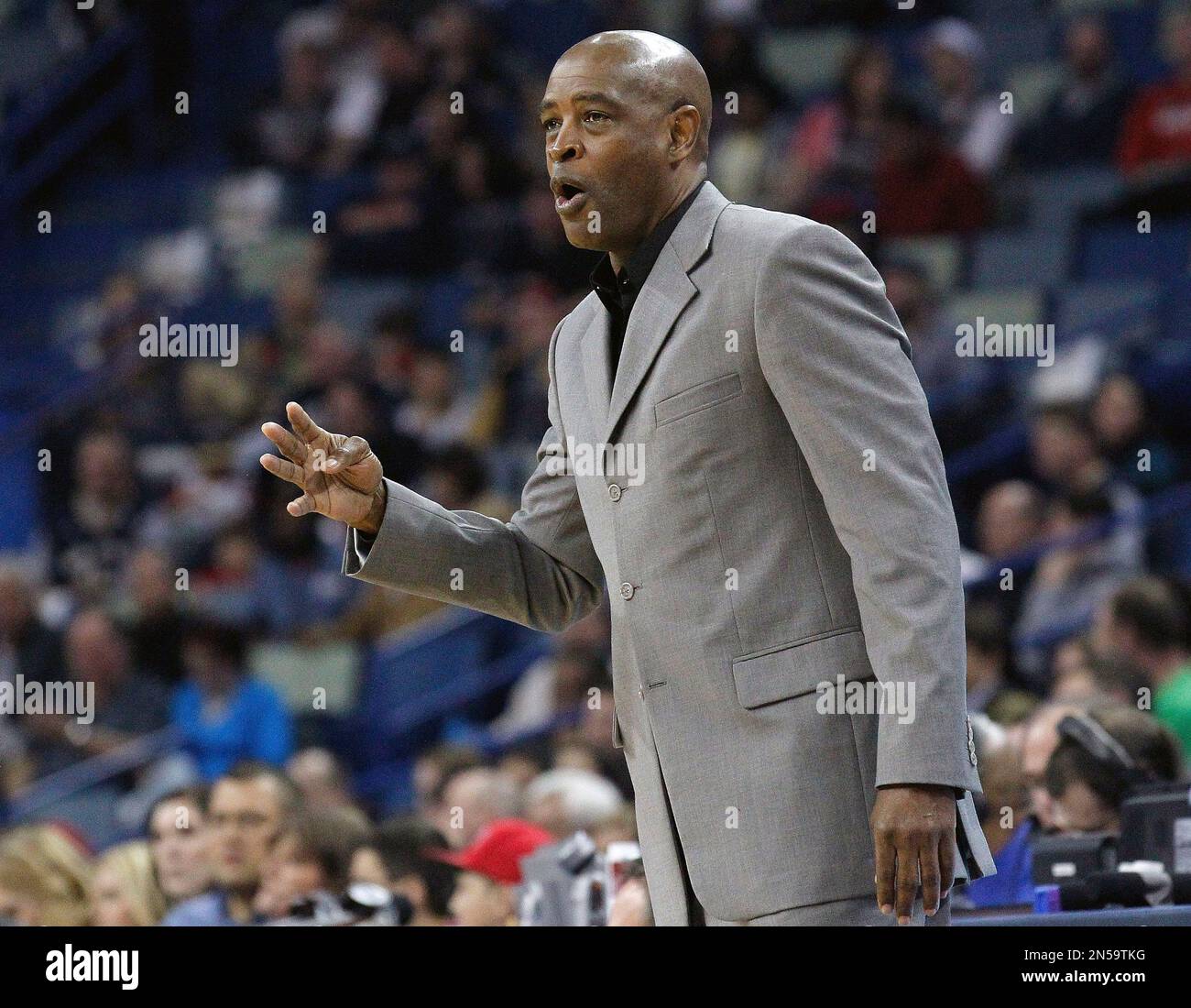 Milwaukee Bucks coach Larry Drew calls to his team against the New ...