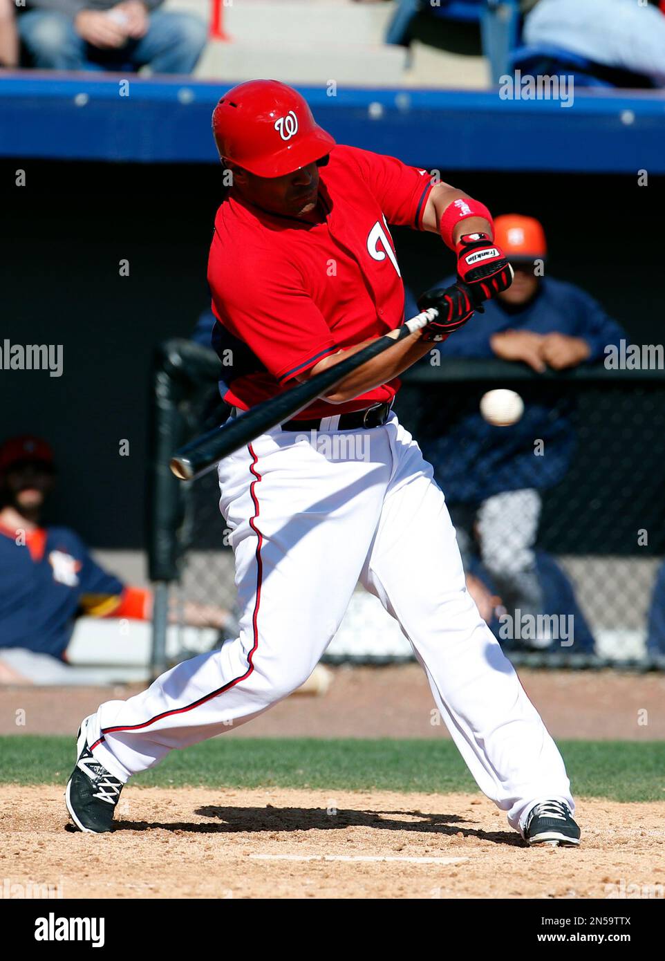Washington Nationals catcher Sandy Leon (41) bats in a spring ...
