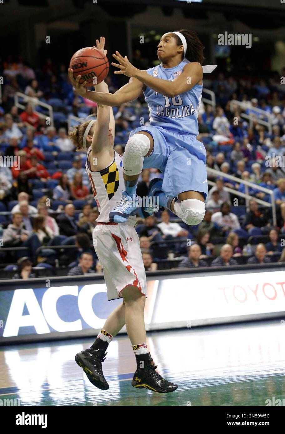North Carolina's Danielle Butts (10) drives past Maryland's Katie Rutan ...
