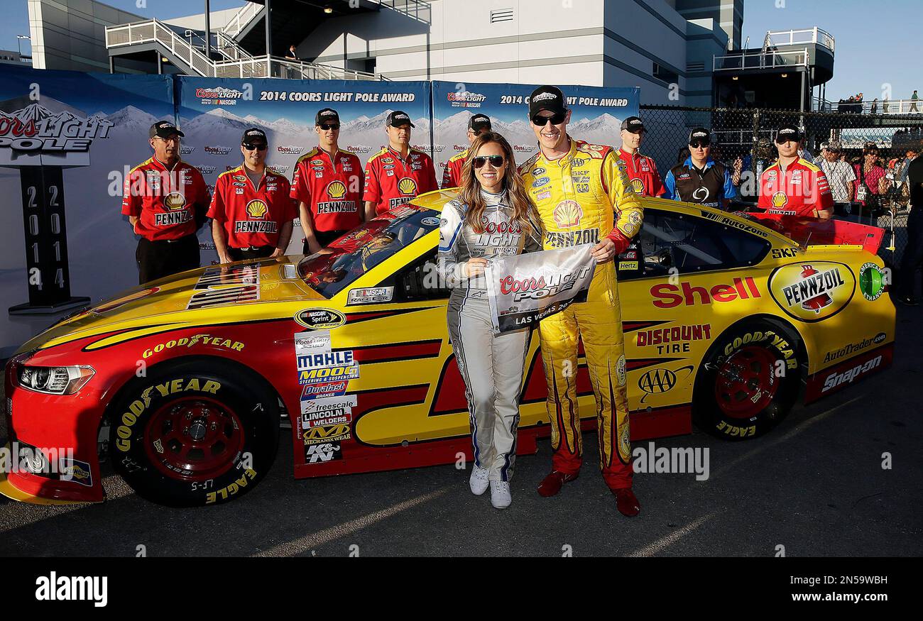 Miss Coors Light, Rachel Rupert, and Joey Logano pose for photos after ...