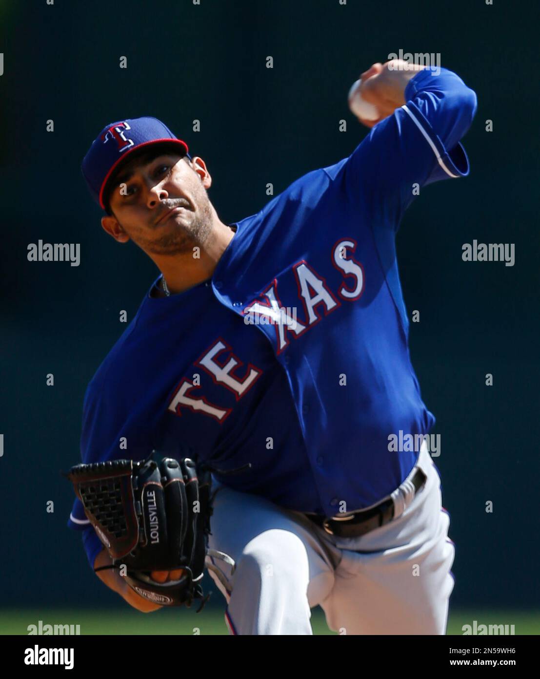 Texas Rangers pitcher Martin Perez throws against the Los Angeles ...