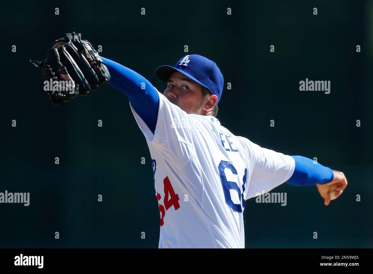 Los Angeles Dodgers pitcher Zach Lee throws against the Texas Rangers ...