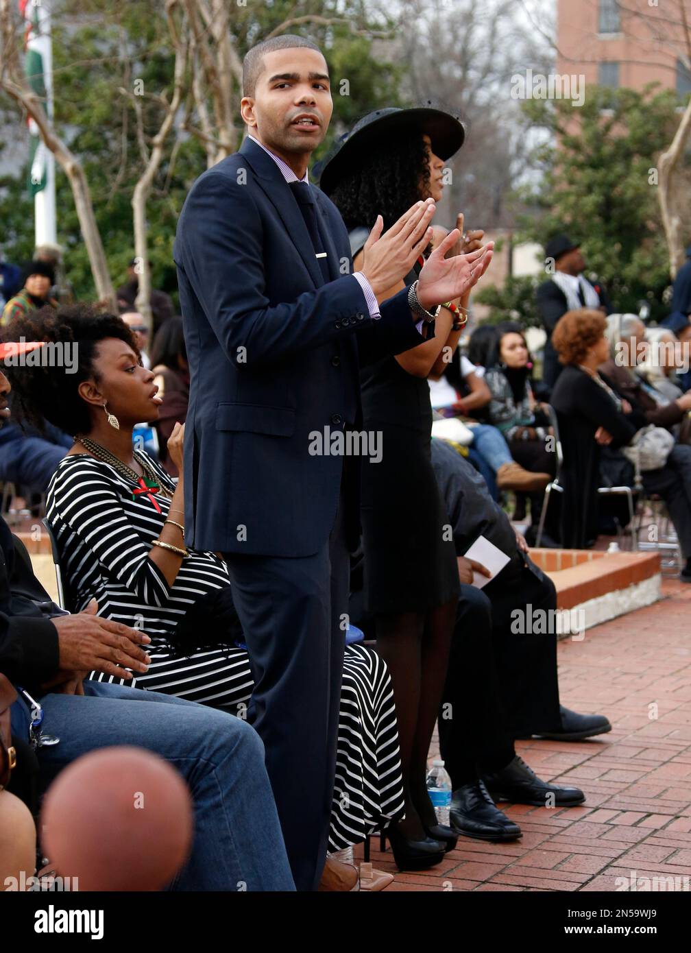 Standing amid family members, Chokwe Antar Lumumba, left, and his ...