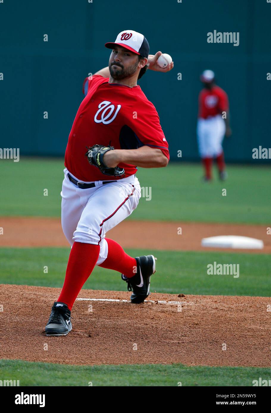Washington Nationals pitcher Tanner Roark (57) warms up from the mound ...