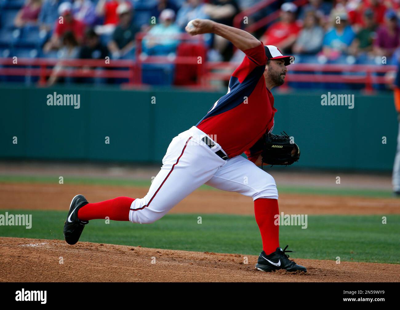 Washington Nationals pitcher Tanner Roark (57) throws in a spring ...