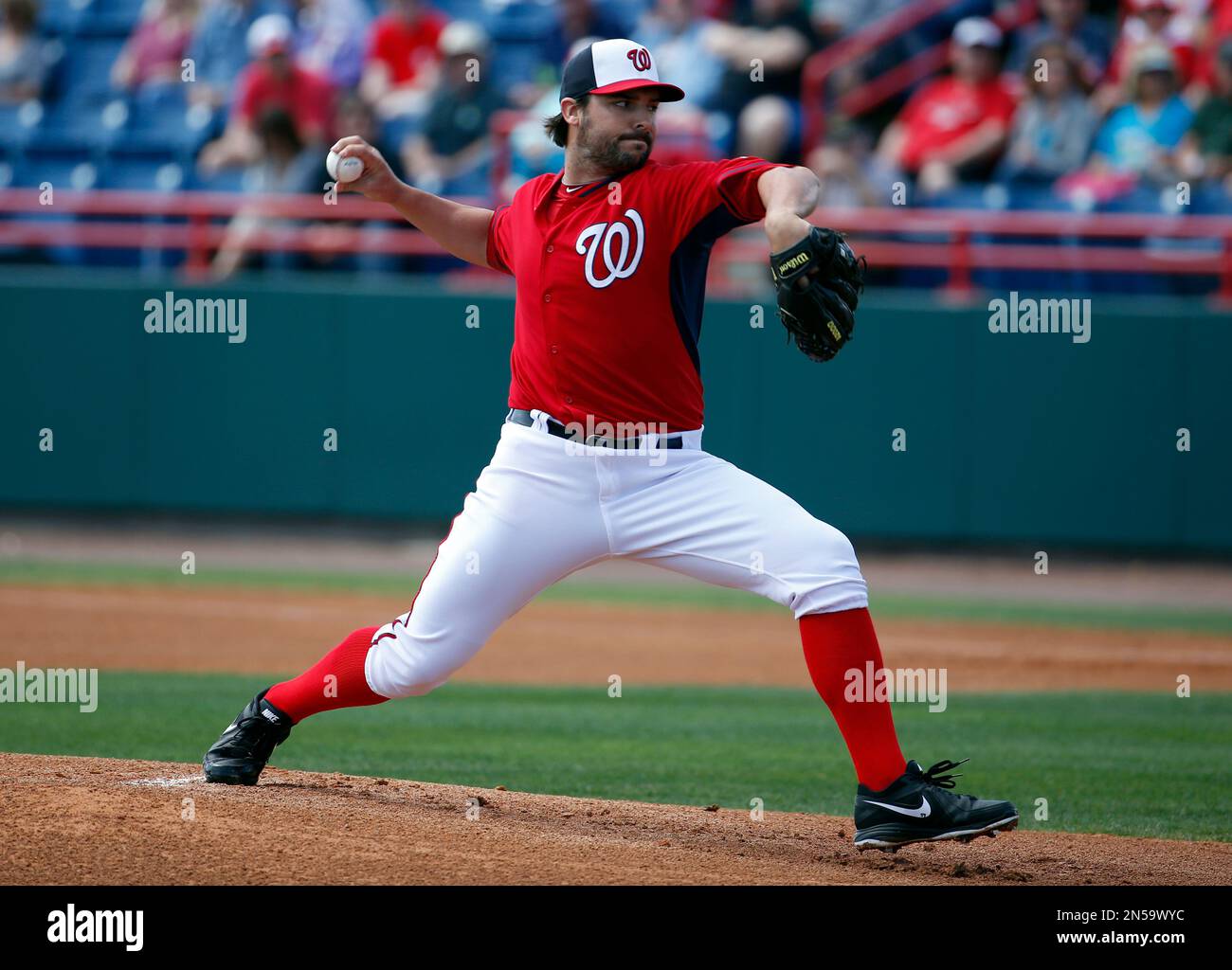 Washington Nationals pitcher Tanner Roark (57) throws in a spring ...