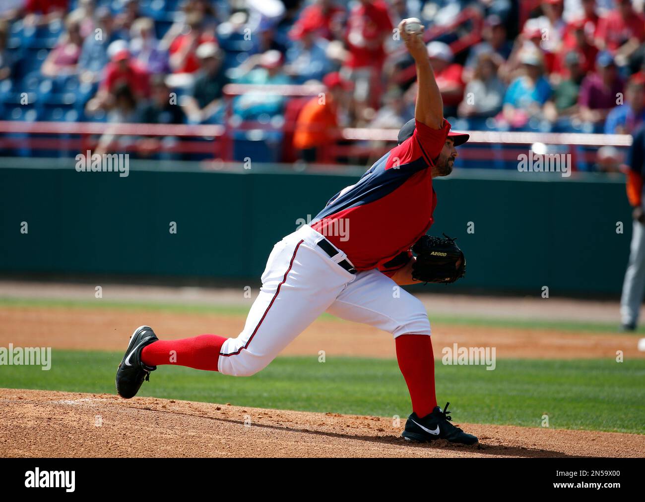 Washington Nationals pitcher Tanner Roark (57) throws in a spring ...