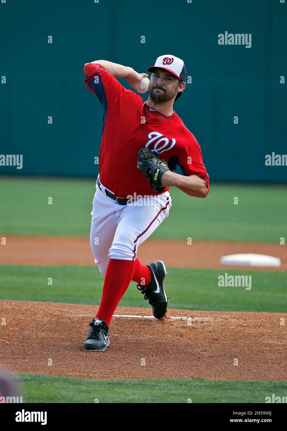 Washington Nationals pitcher Tanner Roark (57) warms up from the mound ...