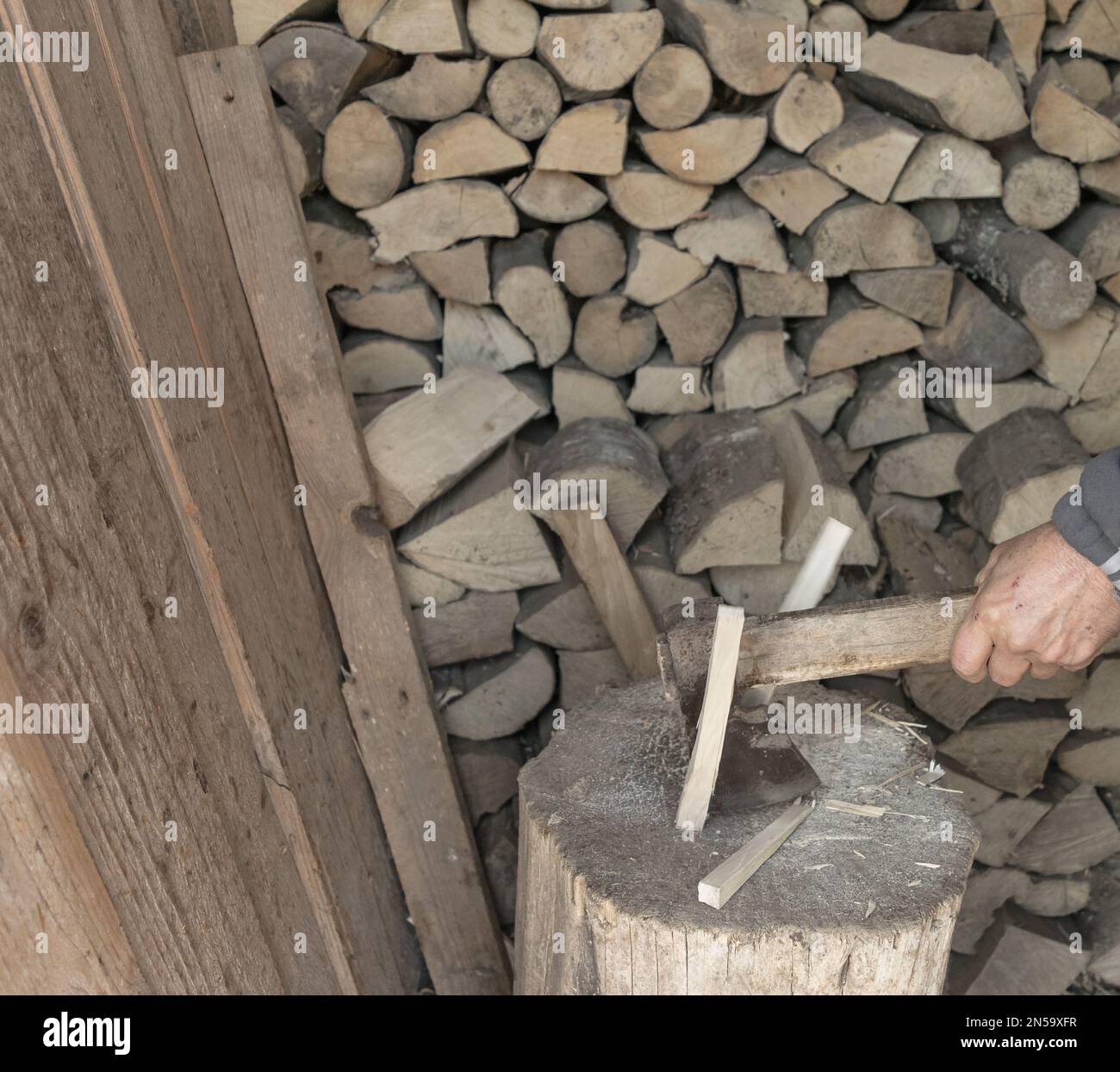 axe chopping wood Stock Photo - Alamy