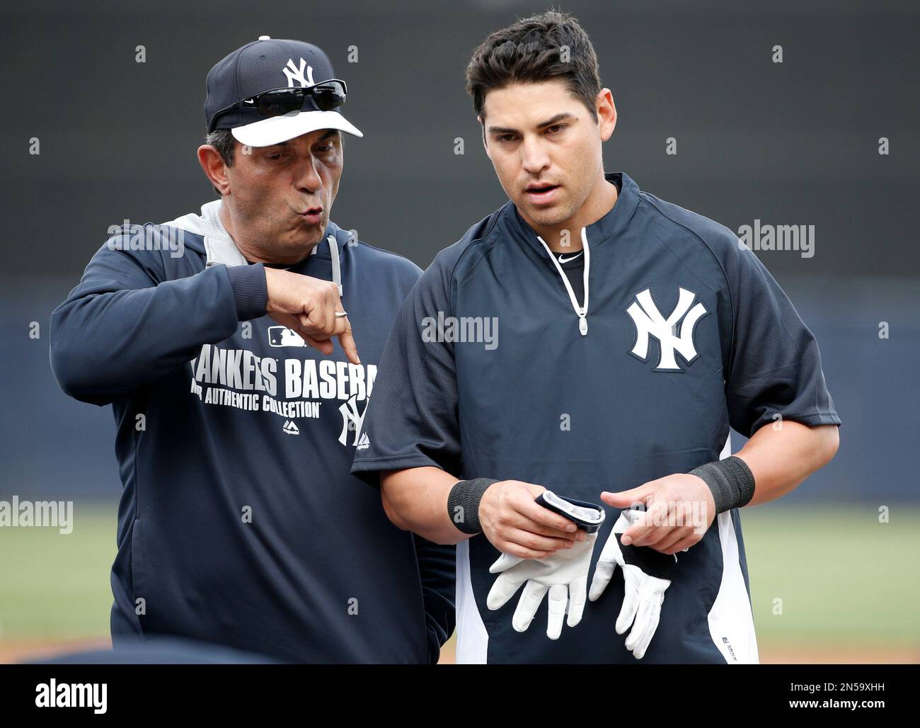 New York Yankees spring training guest instructor Lee Mazzilli, left ...