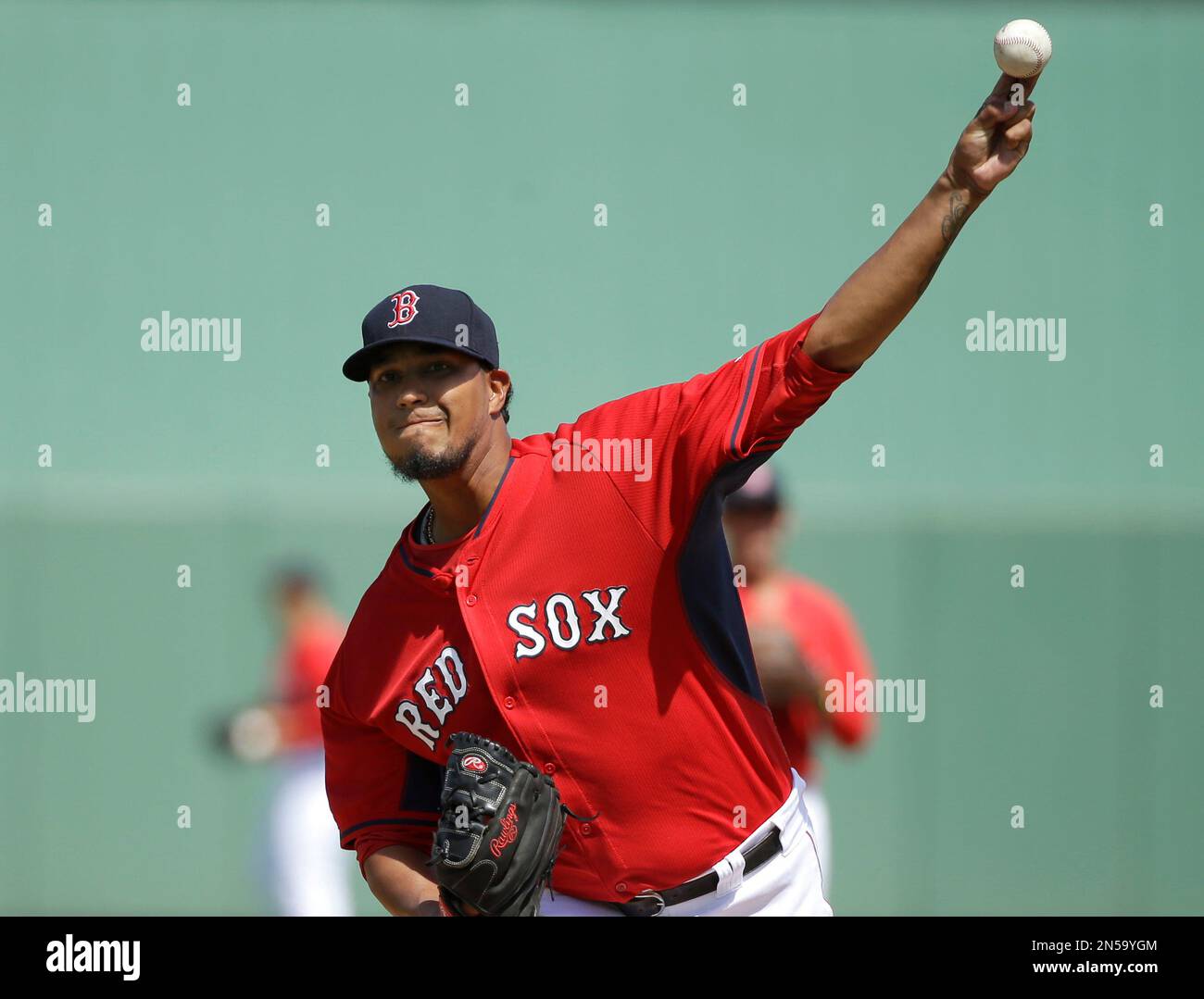Boston Red Sox's Felix Doubront delivers a warm-up pitch during the ...