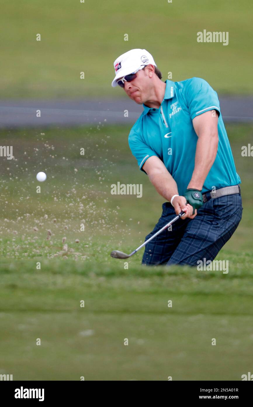 Ricky Barnes of the U.S. hits from a first hole bunker during the ...