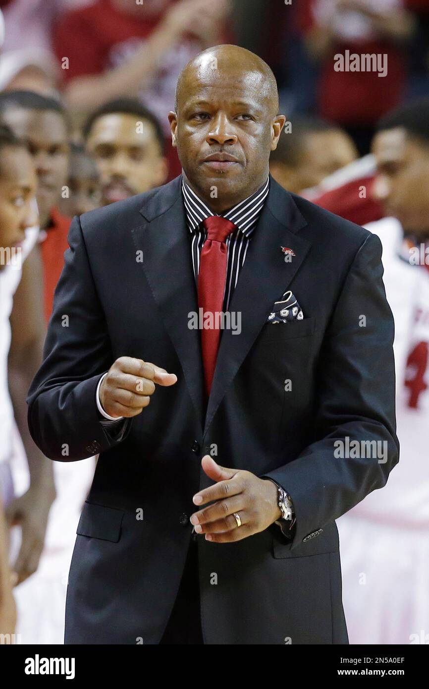 Arkansas coach Mike Anderson watches the second half of an NCAA college ...