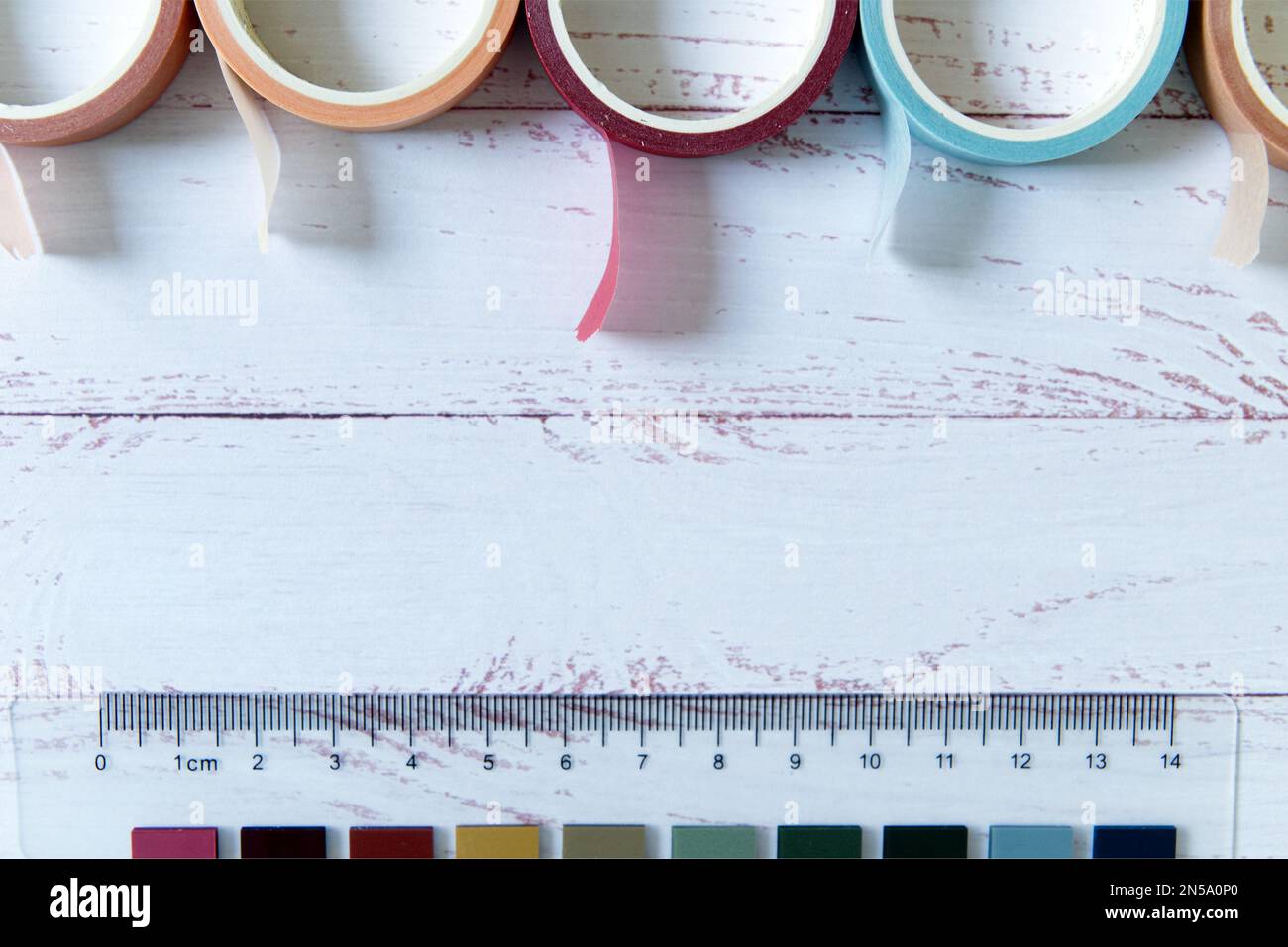 colorful washi tape and ruler on white wooden background - planning and ...