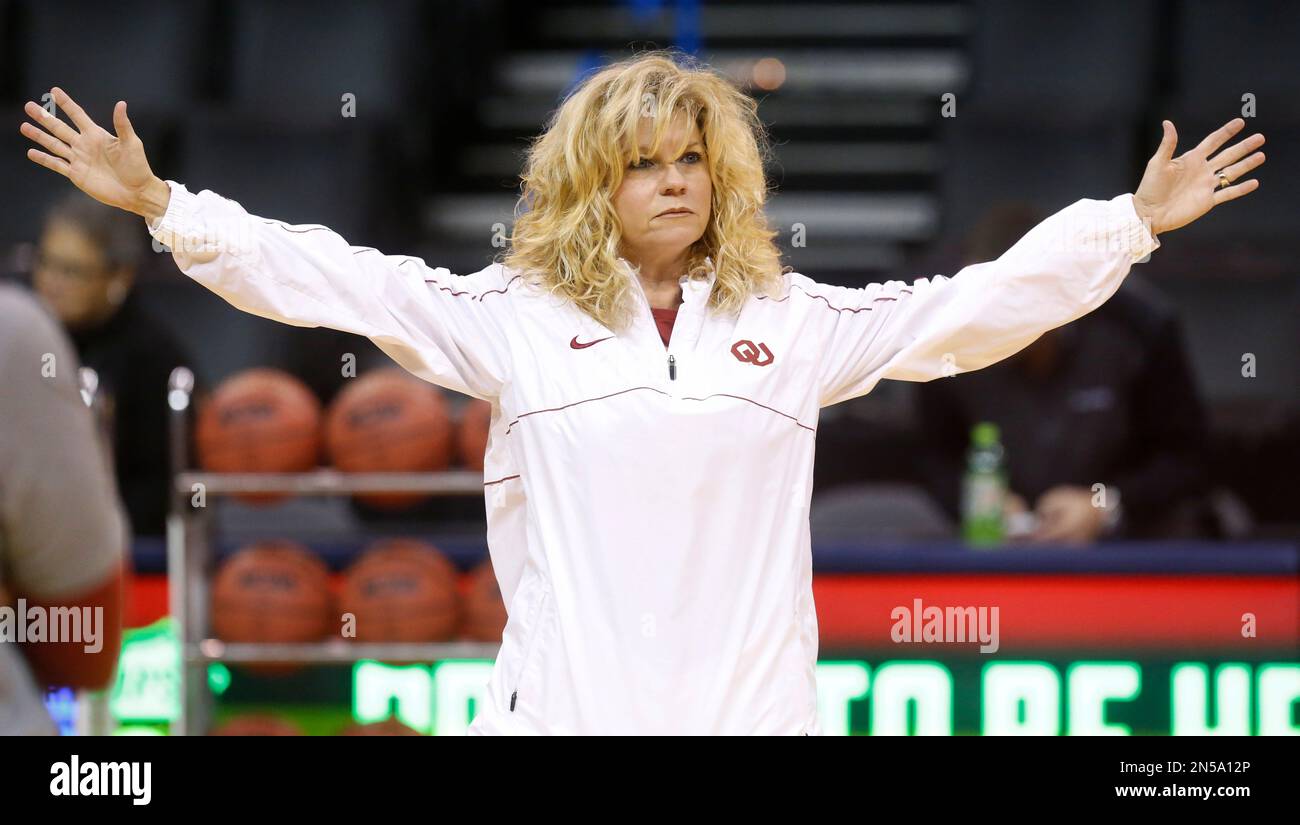 Oklahoma head coach Sherri Coale stretches before the start of a team ...